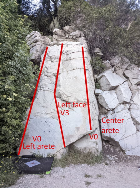 Three routes on the left side of Wall Boulder.
