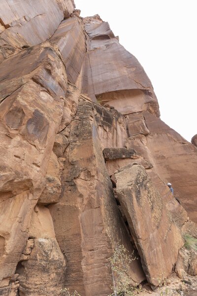 Rob checking out the short approach pitch: wraps around massive flakes ...