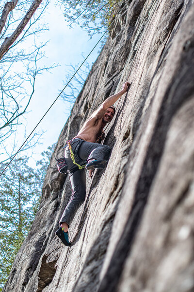 Setting up for the crux move (photo credit: Chuck Pacer, my camera)
