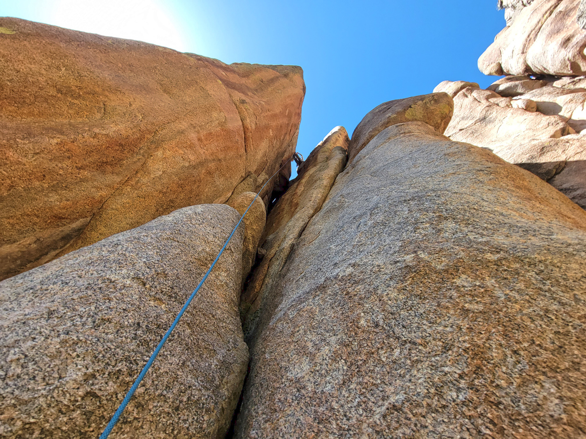 Climber topping out on Chimneying 101.