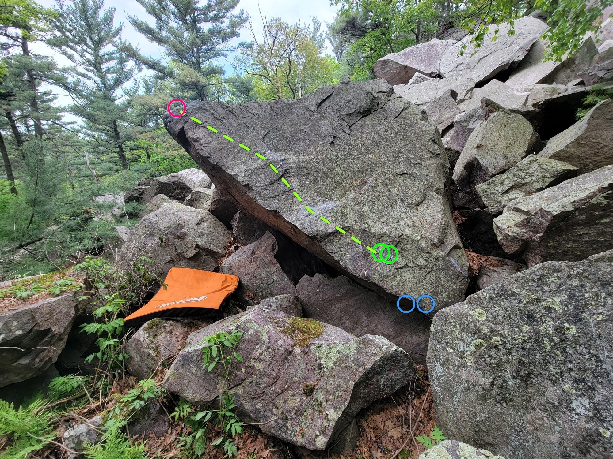It's the giant triangle boulder. Start low left and traverse to the ...