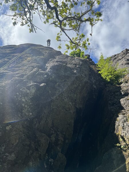 Route is the crack system to the right of the rope.