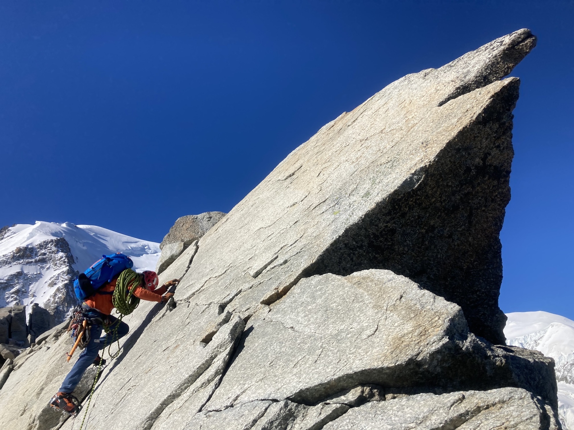 This is a picture of the crux slab downclimb. Start on the pillar left ...