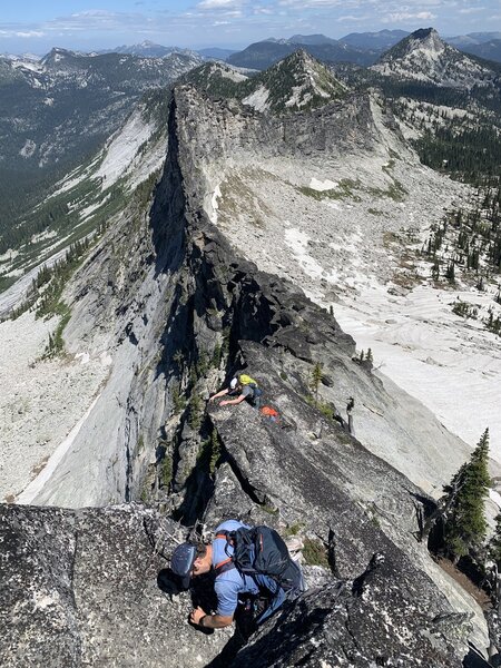Downclimbing to the base of the fin