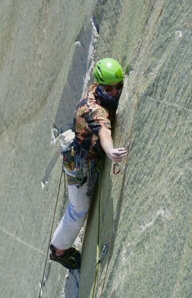Swami places the blind grey metolius tcu before launching into the crux ...