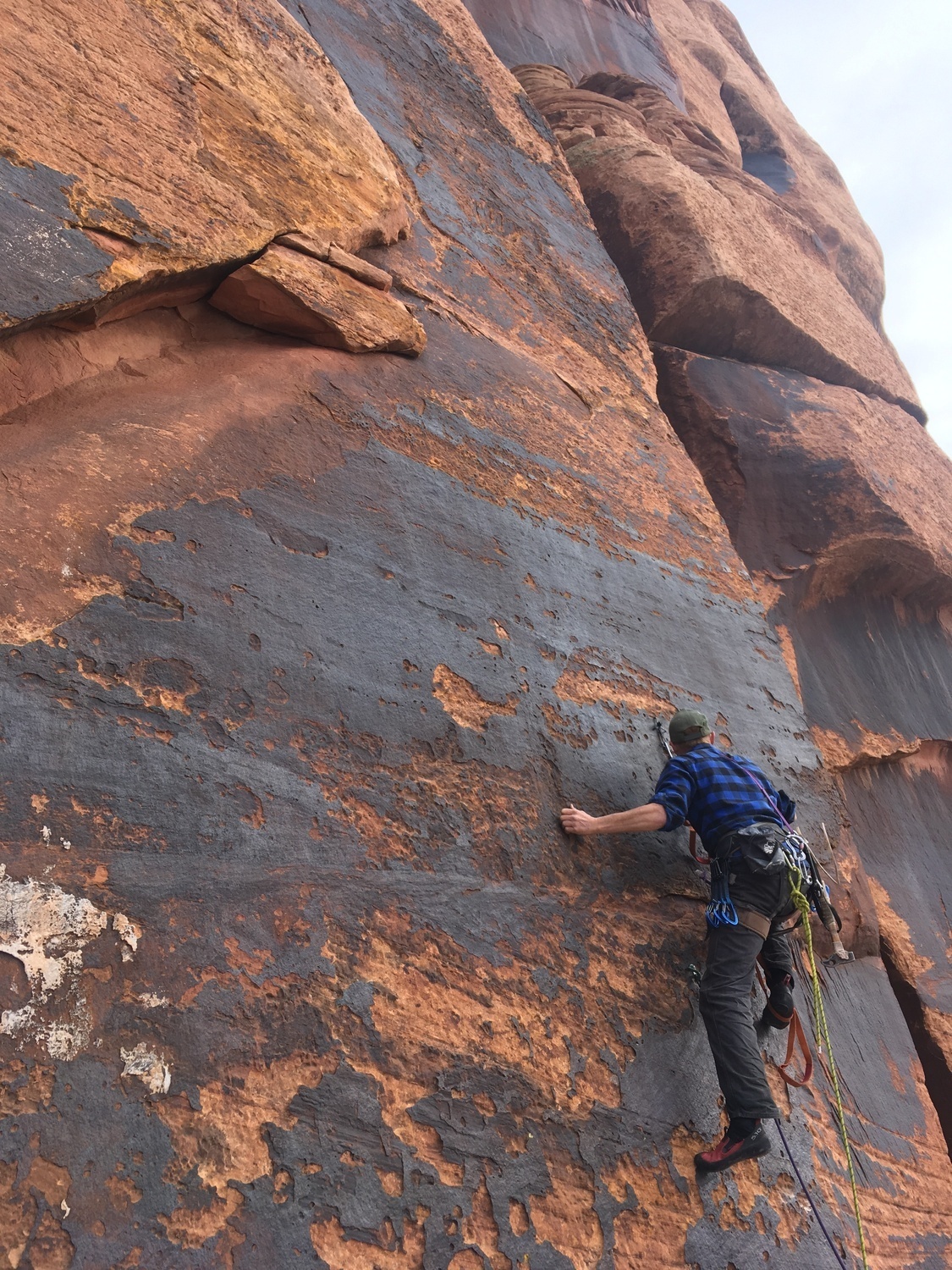 Dave with the hybrid hook/ladder/free climb style on the first ascent ...