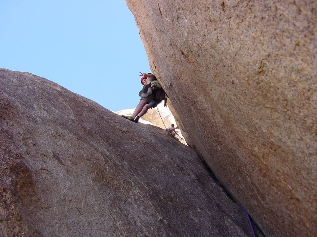 Jeff Dimick climbing the chimney slabs on pitch 2.