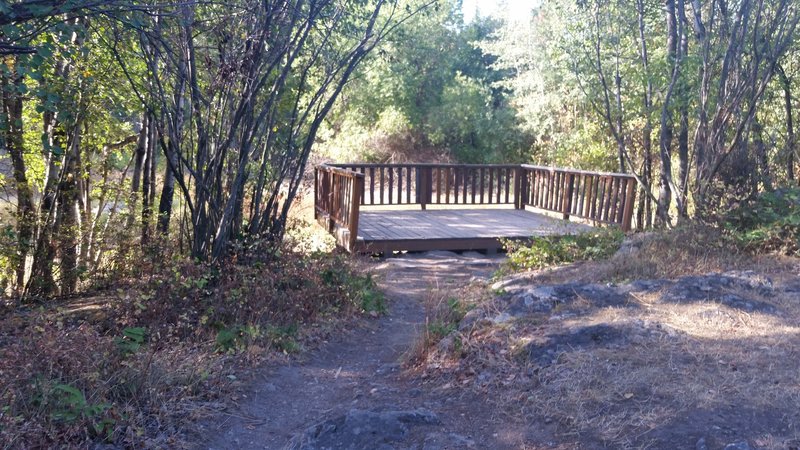 An observation platform by the pond allows for low-impact enjoyment of ...