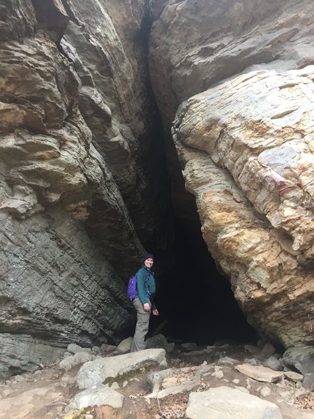My hiking buddy enjoys a very cool small cave with flat floor. It only ...