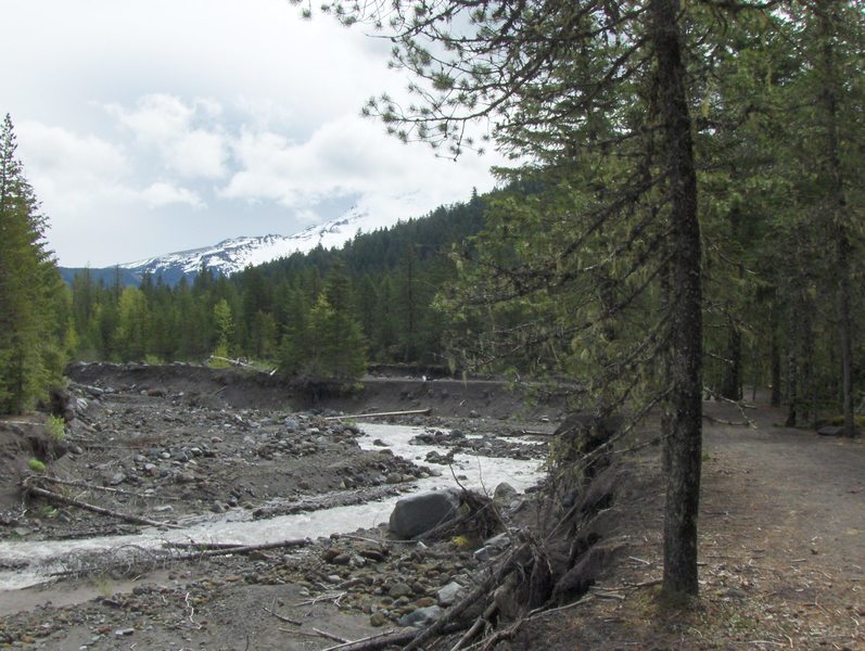 The notoriously unstable Sandy River flows through old mudflows from a ...
