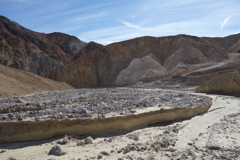 A wide sandy wash runs through Gower Gulch.