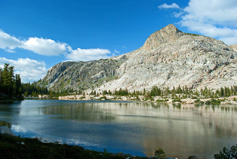 Peninsula Lake and Haystack Peak soak up the sun in the early evening ...