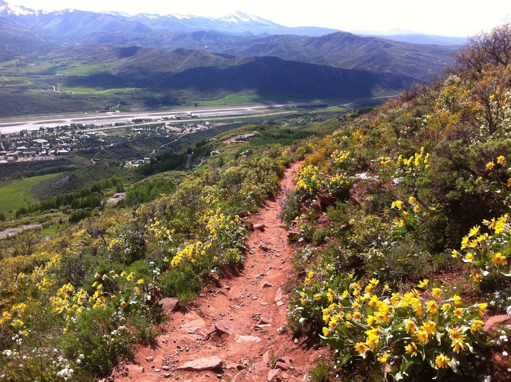 A lower section of the Sunnyside Trail. The trail turns to red rock ...
