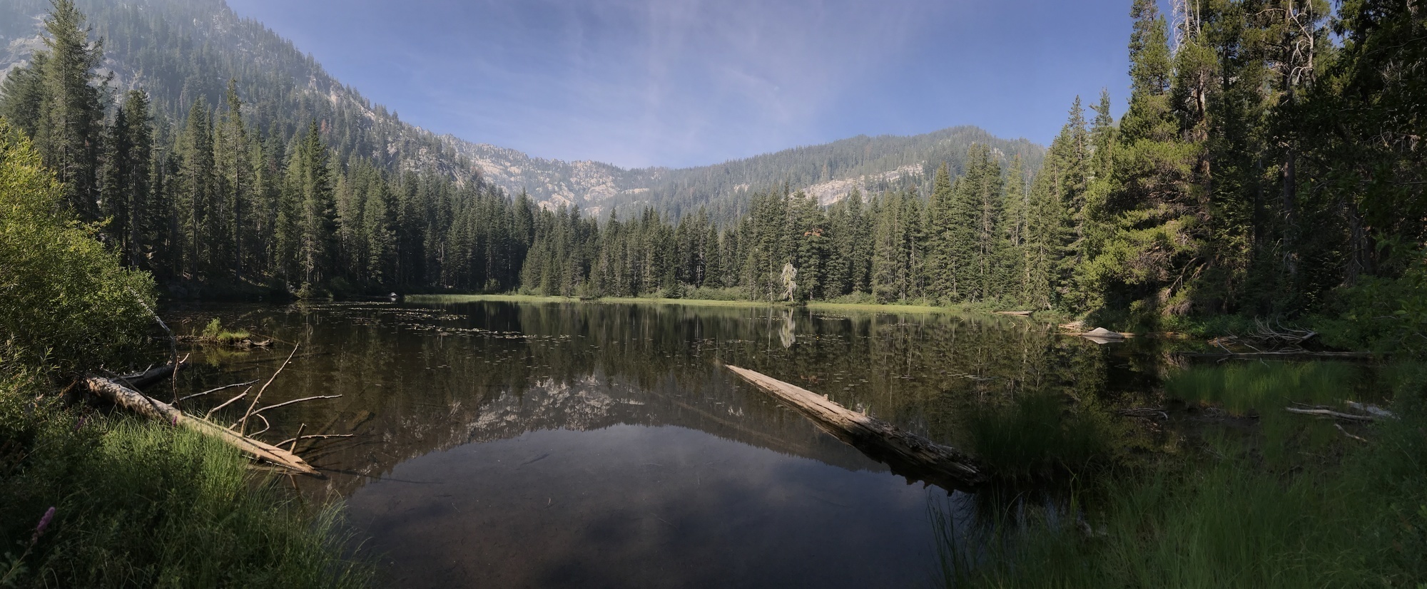 Sugar Lake in Russian Wilderness with patchy wildfire smoke.