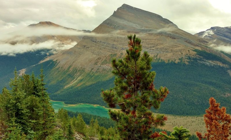 Titkana Peak with beautiful, bluegreen Adolphus Lake far below, looking ...