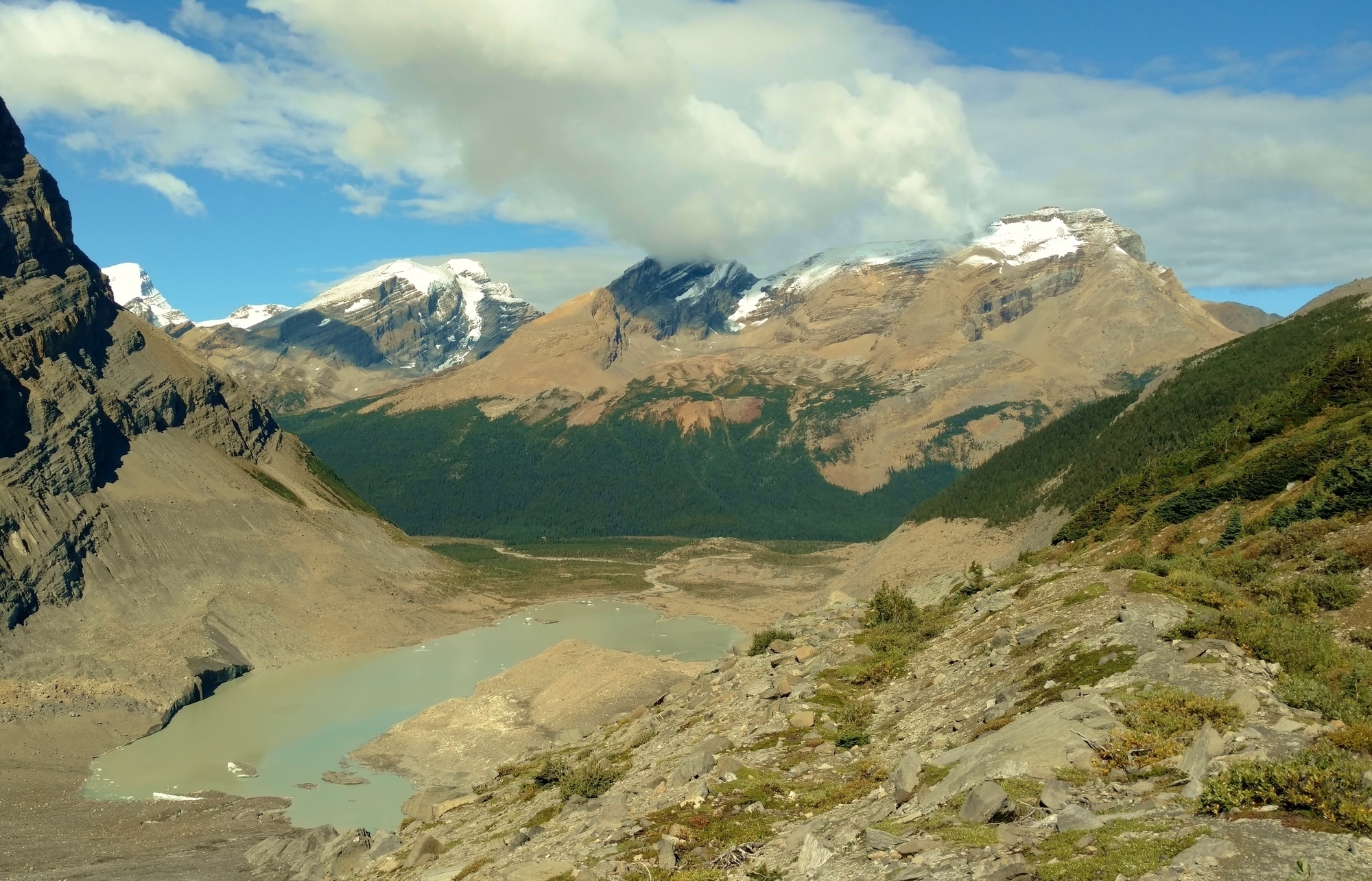 Glacial Robson Lake where Robson River begins, with the Robson River ...