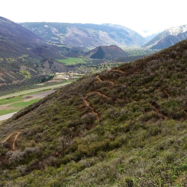Airline Trail with tiny riders and big berm turns. Airport runway, Red ...