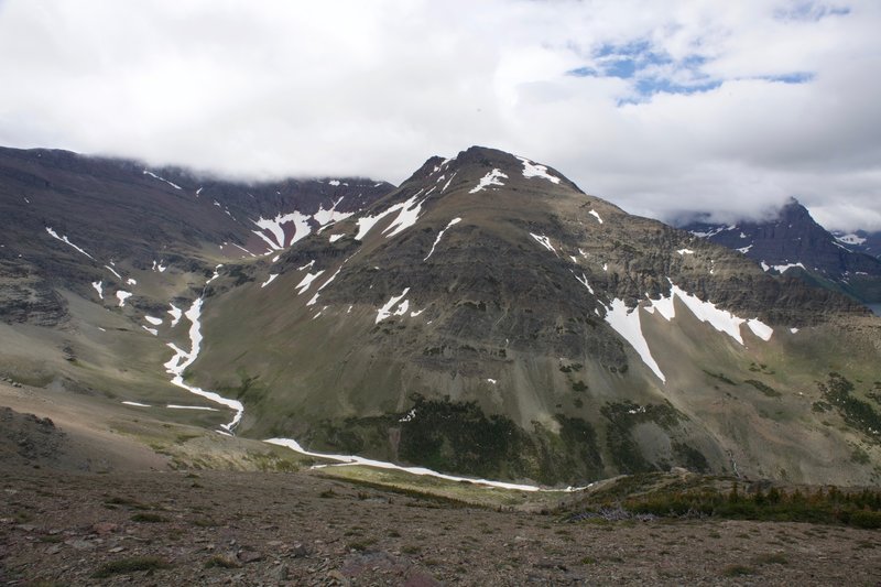 Appistoki Peak and Mount Henry sit across the valley. In the spring ...