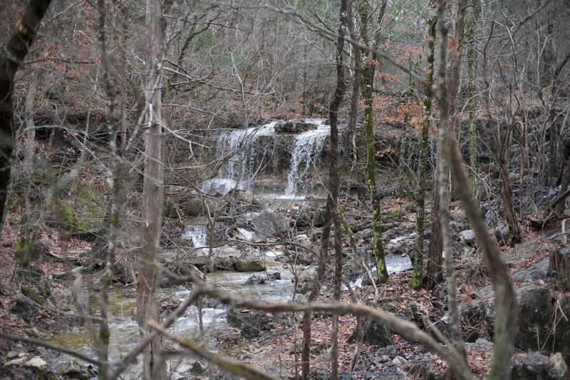 A series of waterfalls sit off to the right hand side of the trail ...