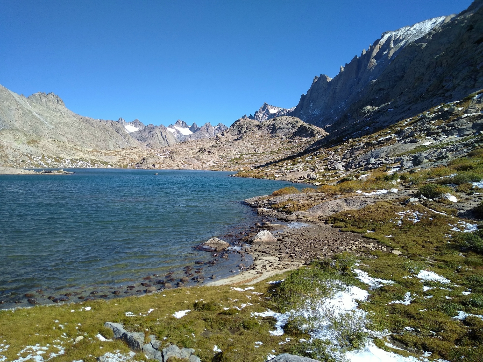 One of the several lakes in Titcomb Basin. Fremont Peak, 13,745 feet ...