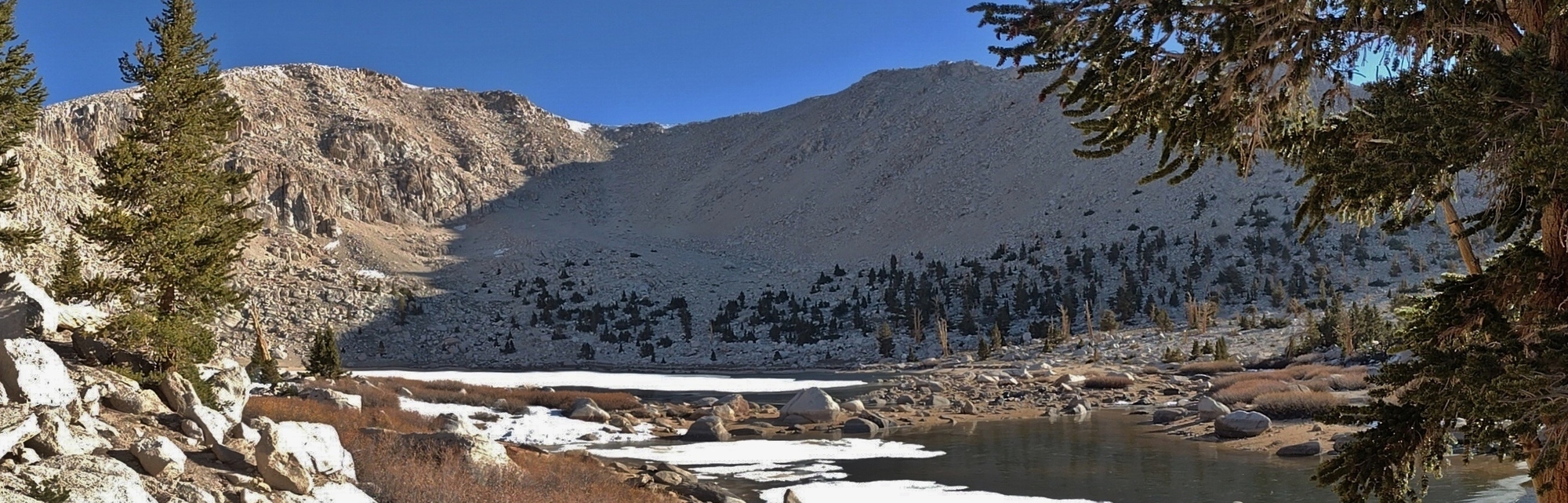 Chicken Spring Lake on a cold, early May morning. Much of the lake is ...