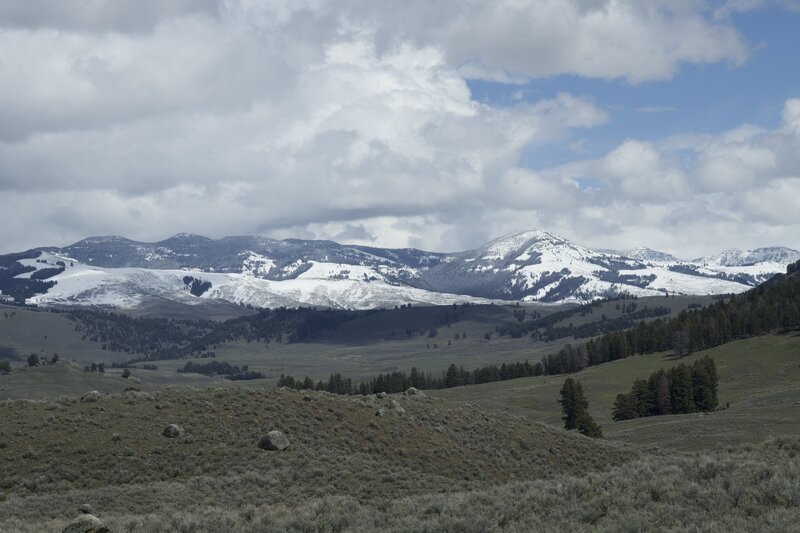 In the spring, snow caps the surrounding mountains. The views from the ...