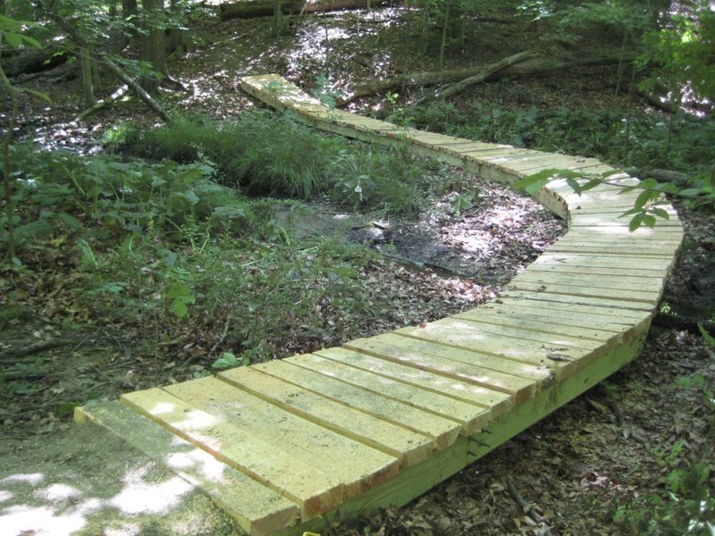 Rough Cut Cedar curved bridge to Sawtooth