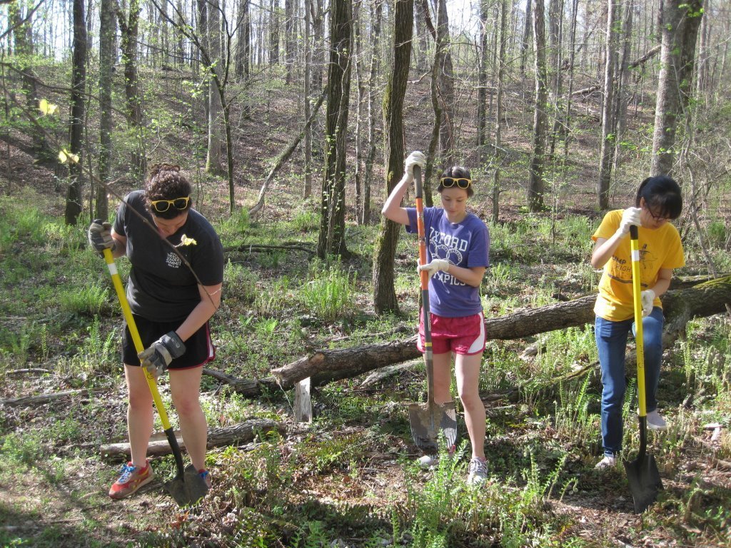 A volunteer trail work party helps to construct the Green Loop. Where ...