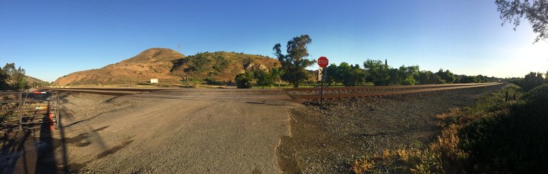Cross the tracks to get to the Scully Trailhead (left) OR continue ...