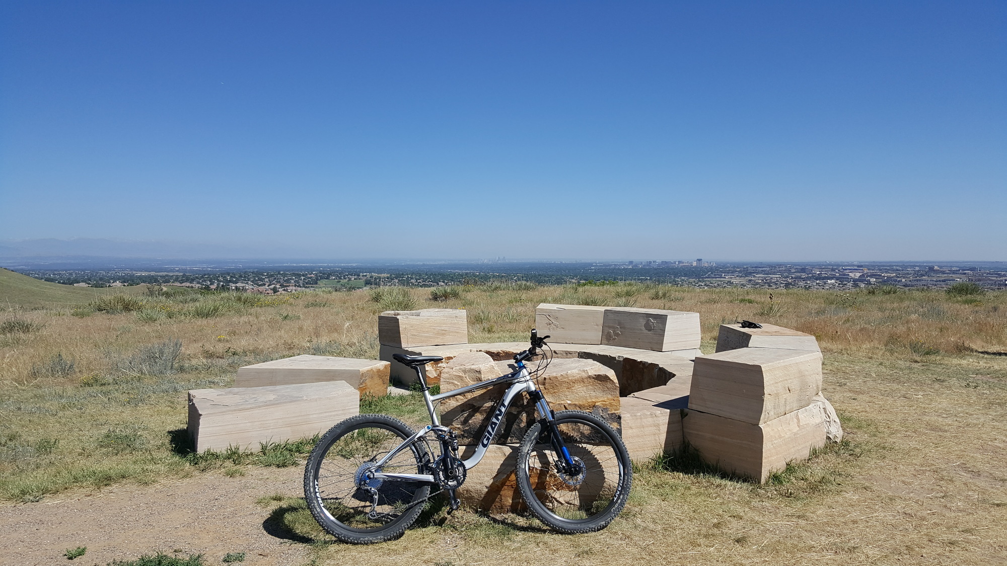 Ridge Line High Point lookout. Background is downtown Denver and ...