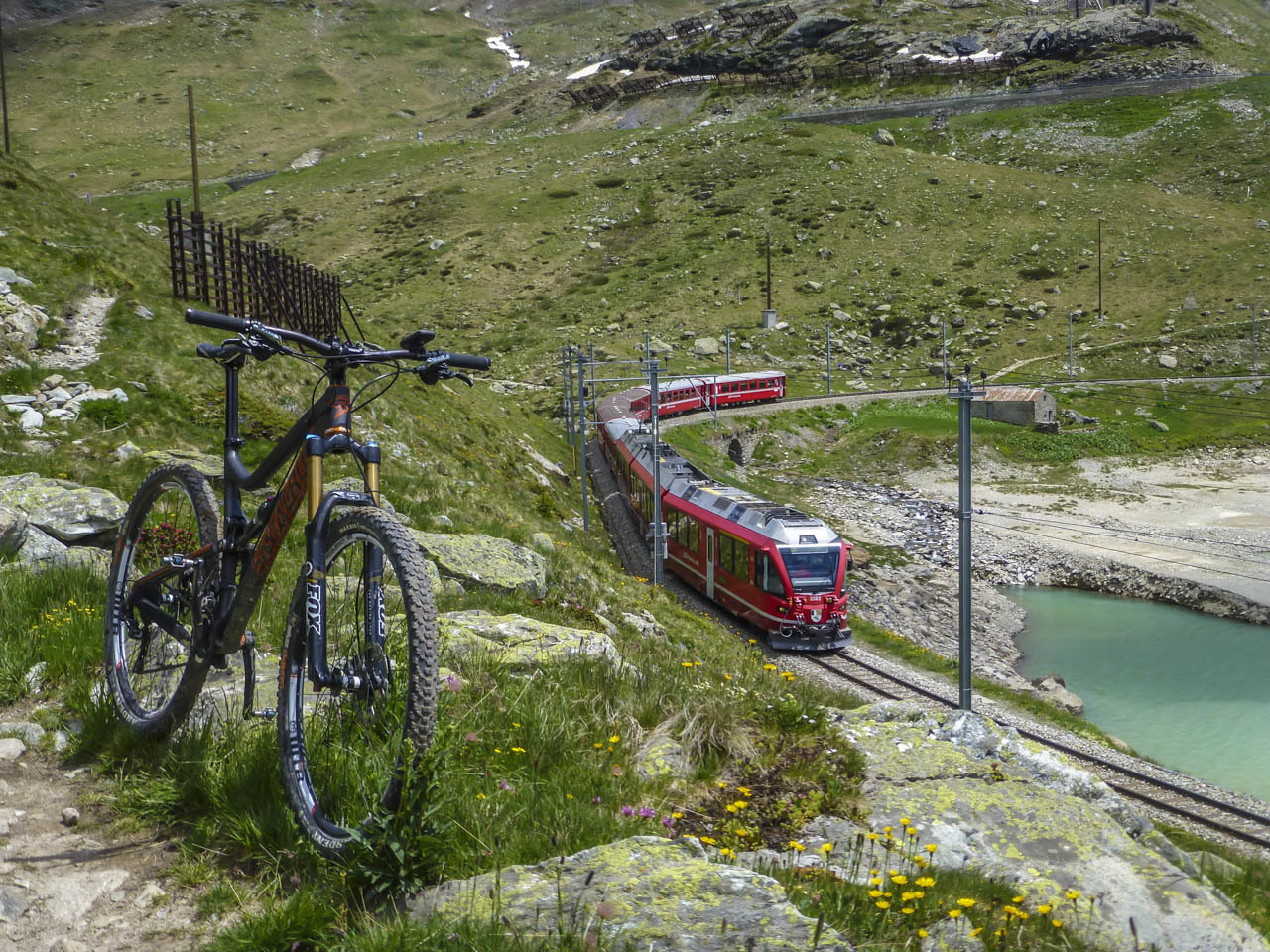 Singletrack paralleling the Bernina Express tracks through the Bernina ...