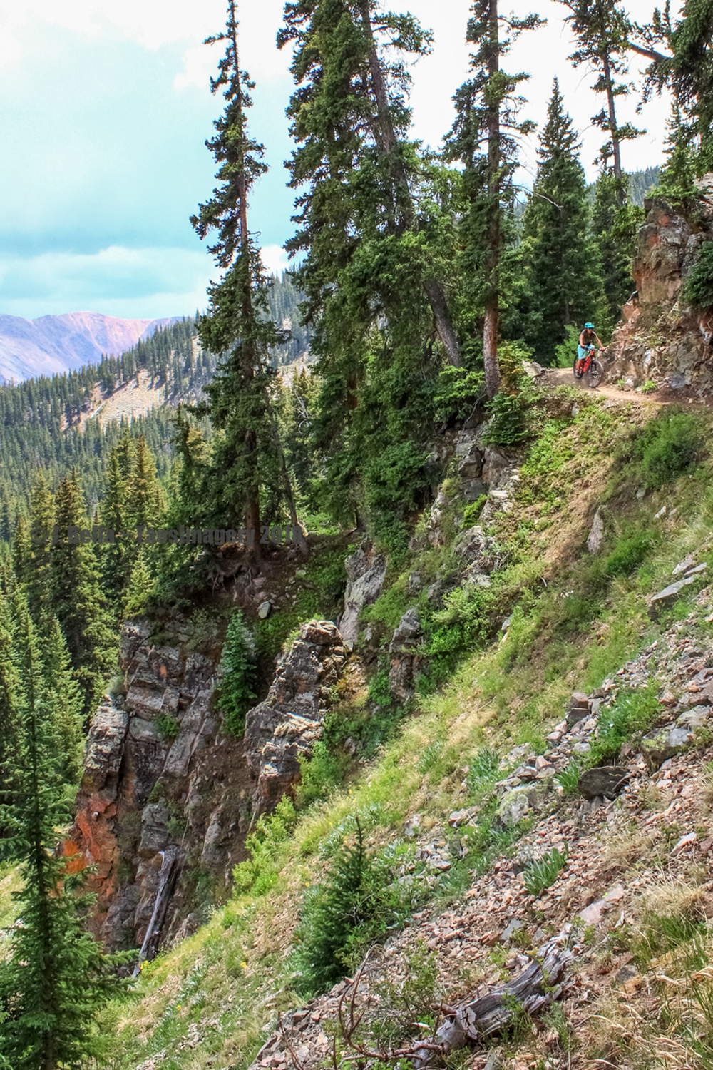 Steep terrain and cliffs where the Lost Lake trail crosses a series of ...
