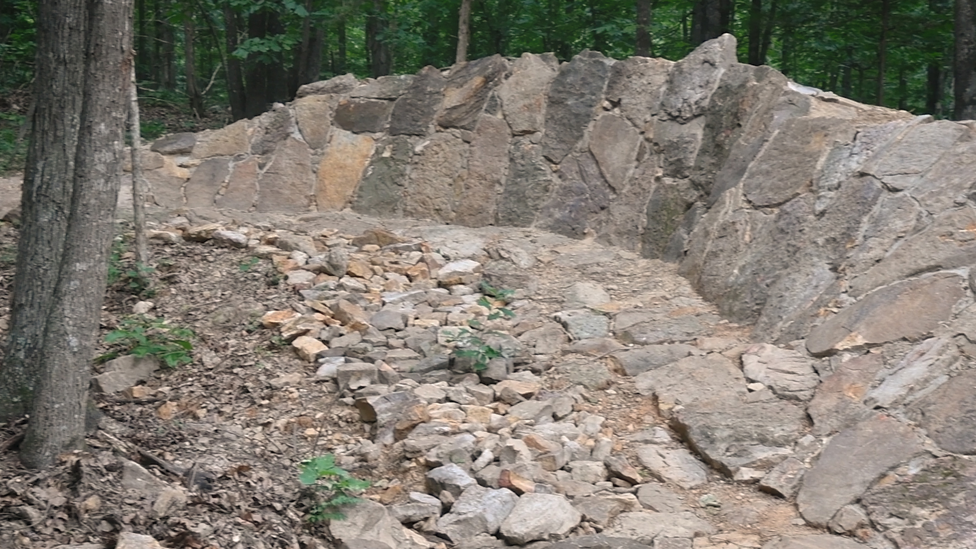 Impressive rock berm/wall ride!