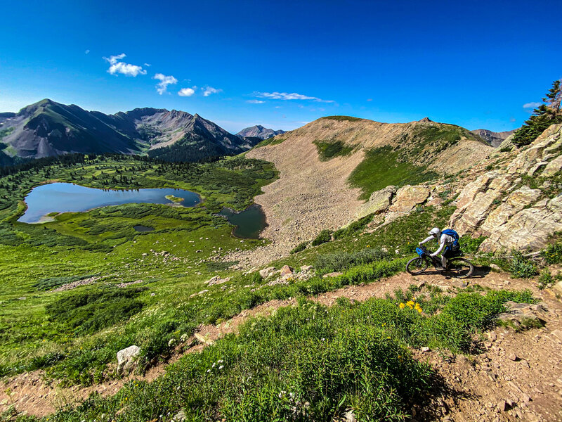 Descending to Taylor Lake on a thru-bike from Denver to Durango. Photo ...